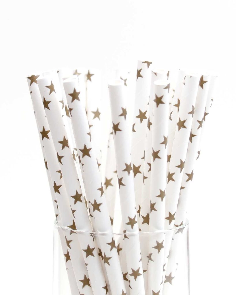 Papirsugerør med guldstjerner