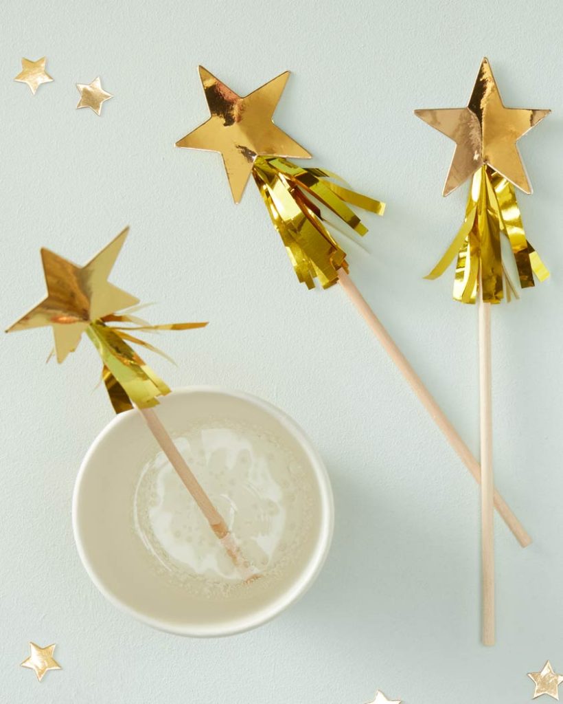 Guld stjerne drinks pinde med kvaster - pynt til nytårsdrinken